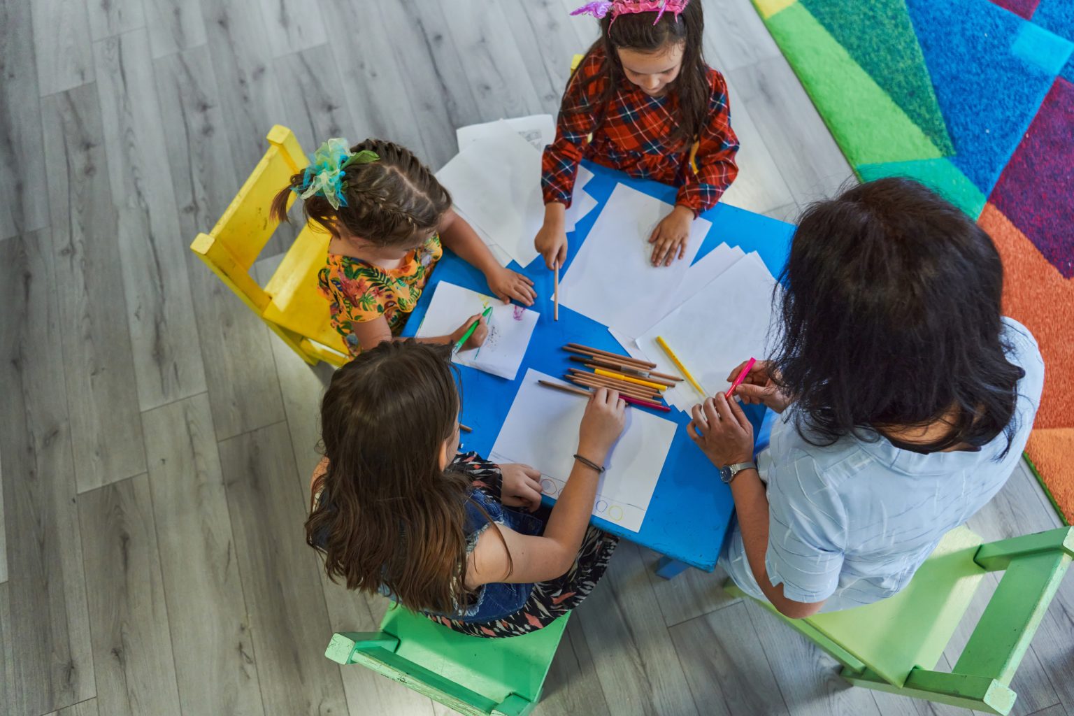 Creative kids during an art class in a daycare center or elementary ...